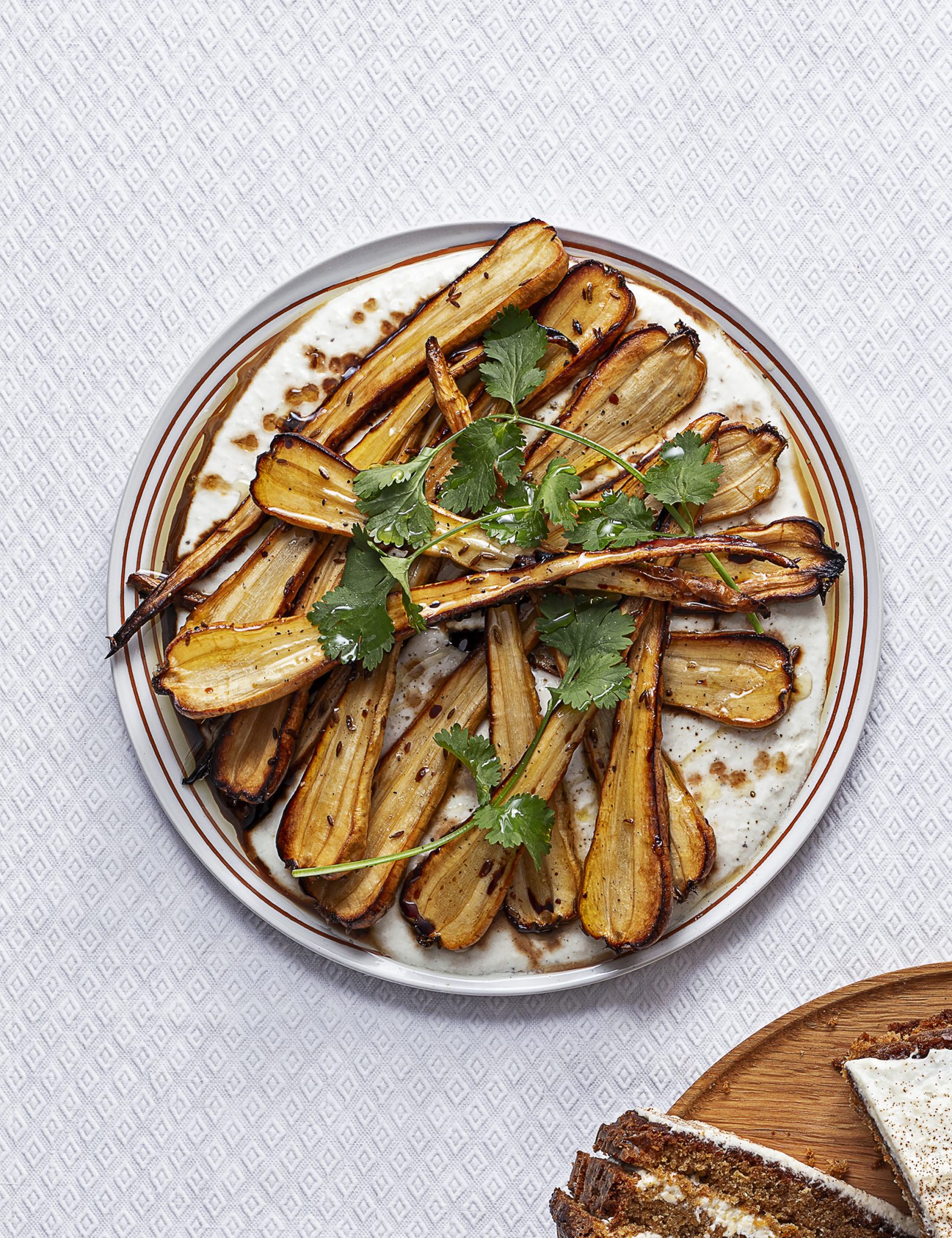 Roasted parsnips with honey and cumin, yogurt and garlic sauce