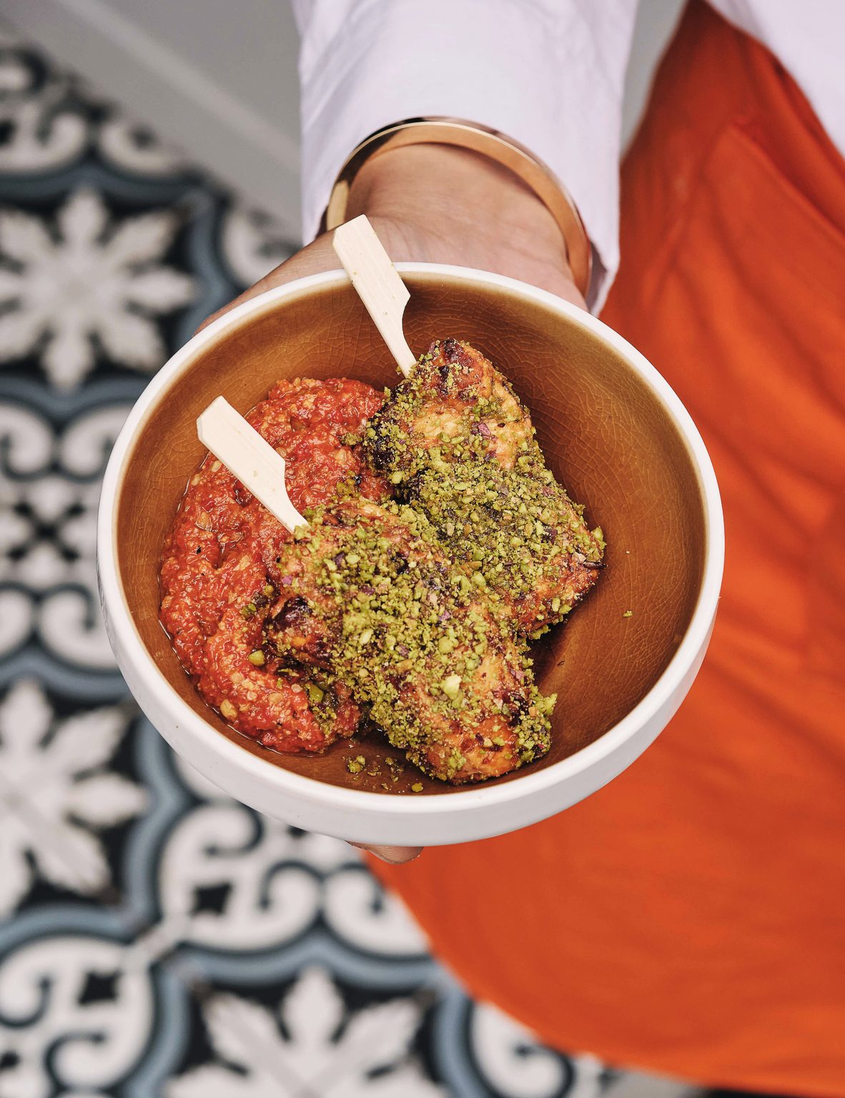 Taouk, chicken skewers, in pistachio crumbs and mouhammara