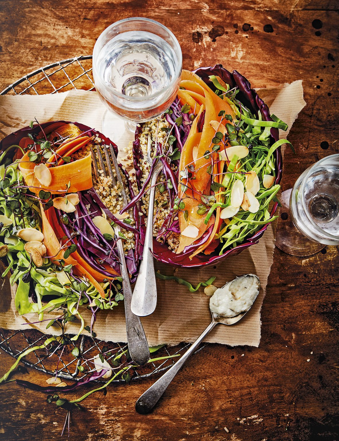 Wrap with red cabbage, quinoa, carrots, pointed cabbage, tahini sauce
