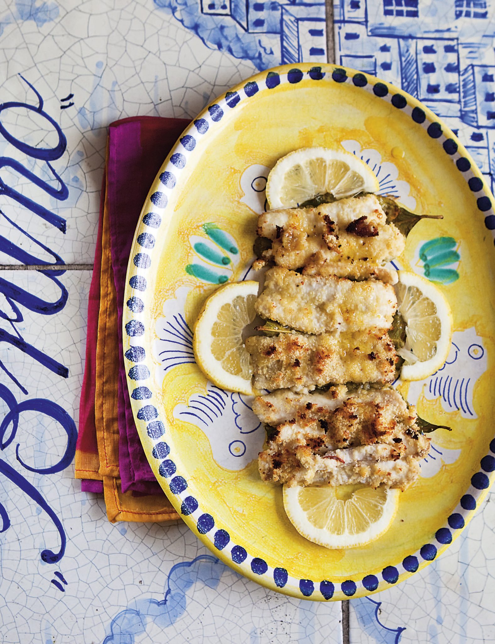 Fish fillets on lemon leaves